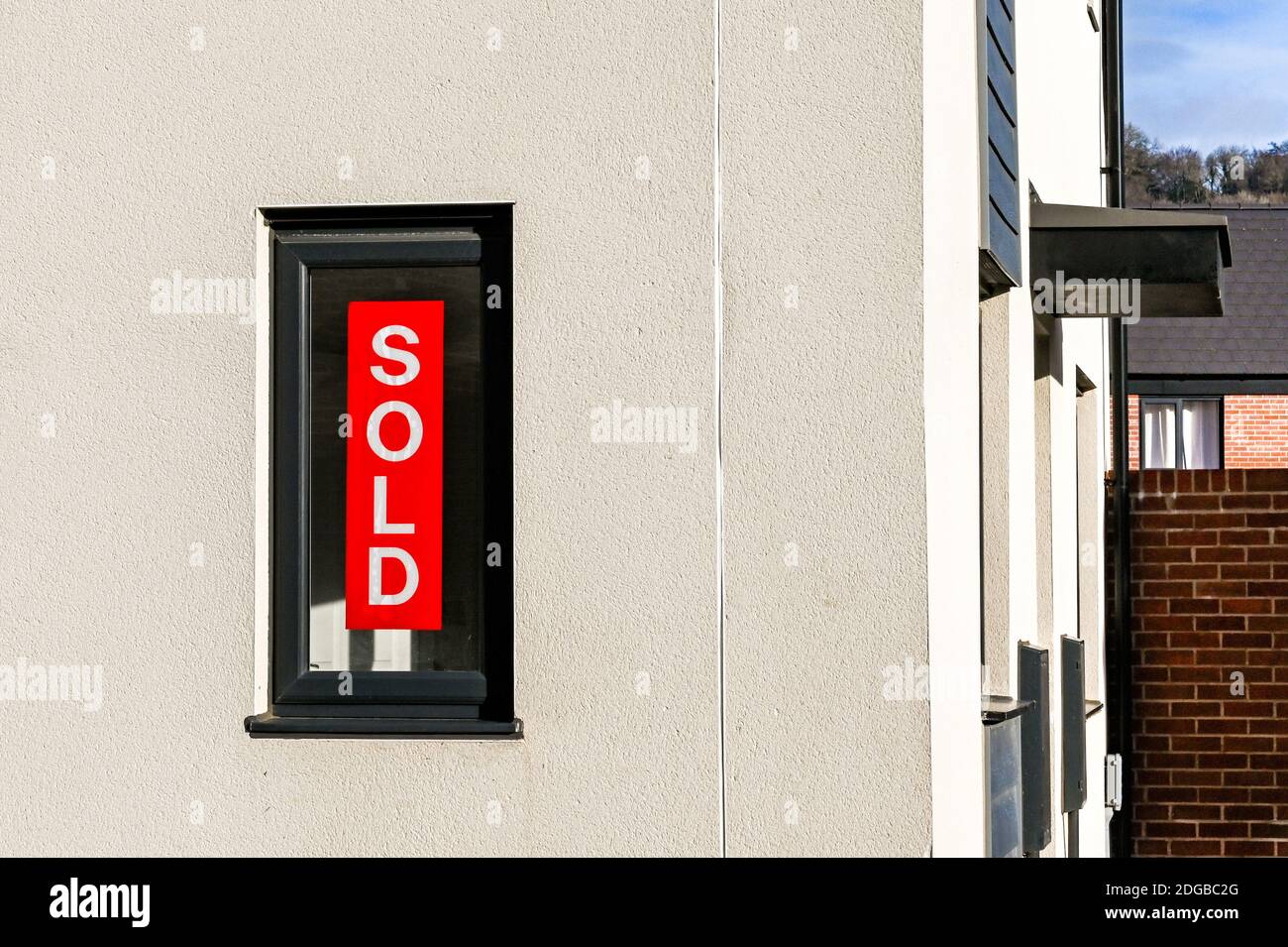 Cardiff, Wales - December 2020: Sold sign in the window of a house on a ...
