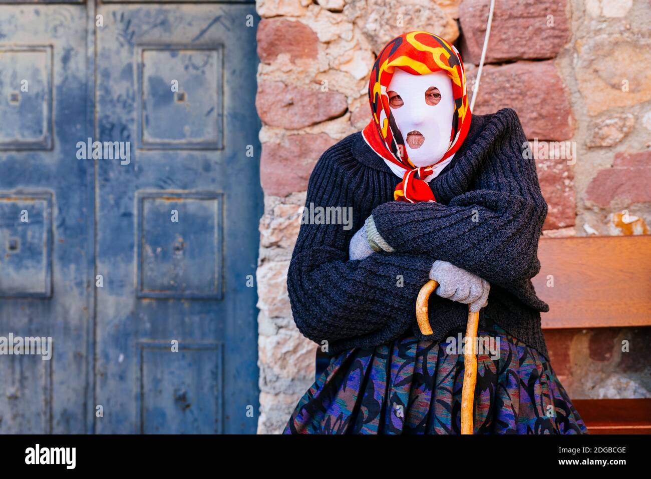 Mascarita - Masked Figure, sitting on a bench waiting for the arrival ...