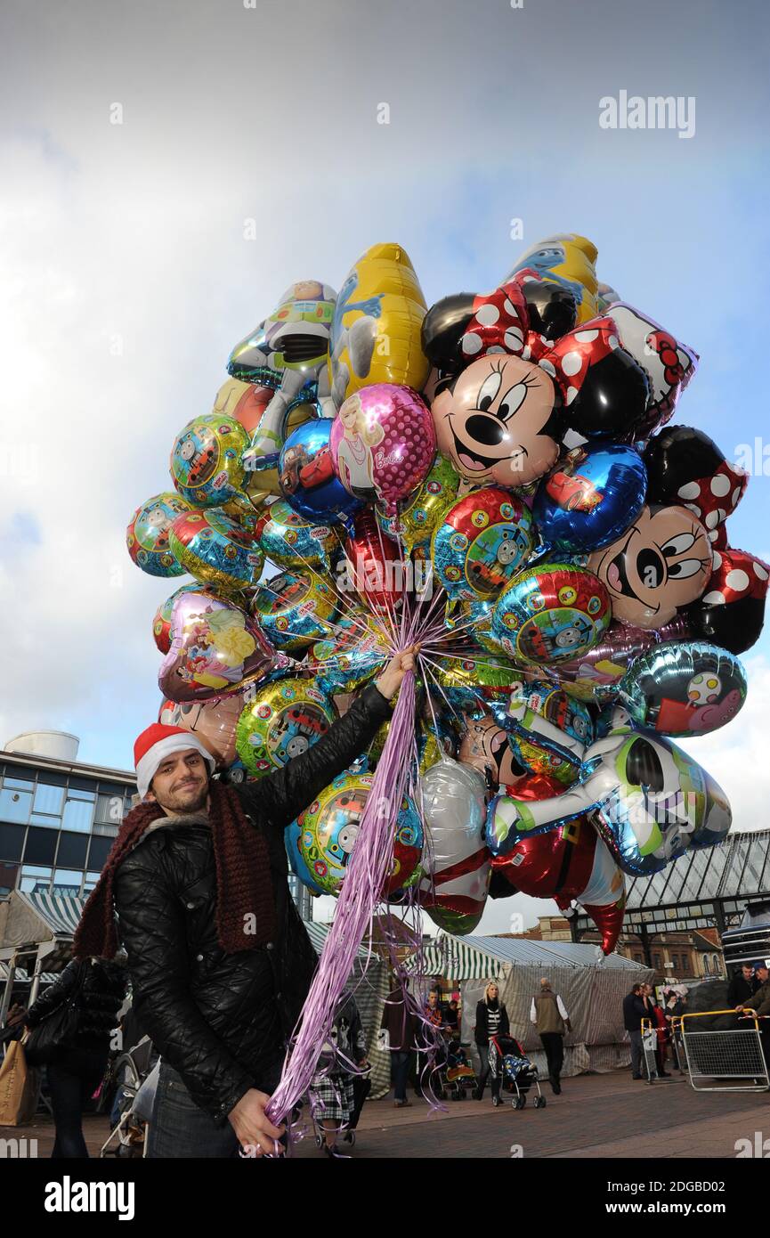 Man selling balloons hi-res stock photography and images - Alamy