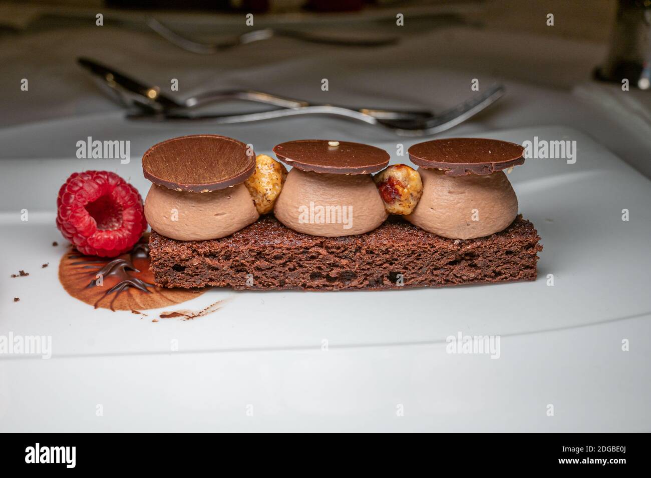 Chocolate cake with raspberry, hazelnut. Delicious dessert Stock Photo ...