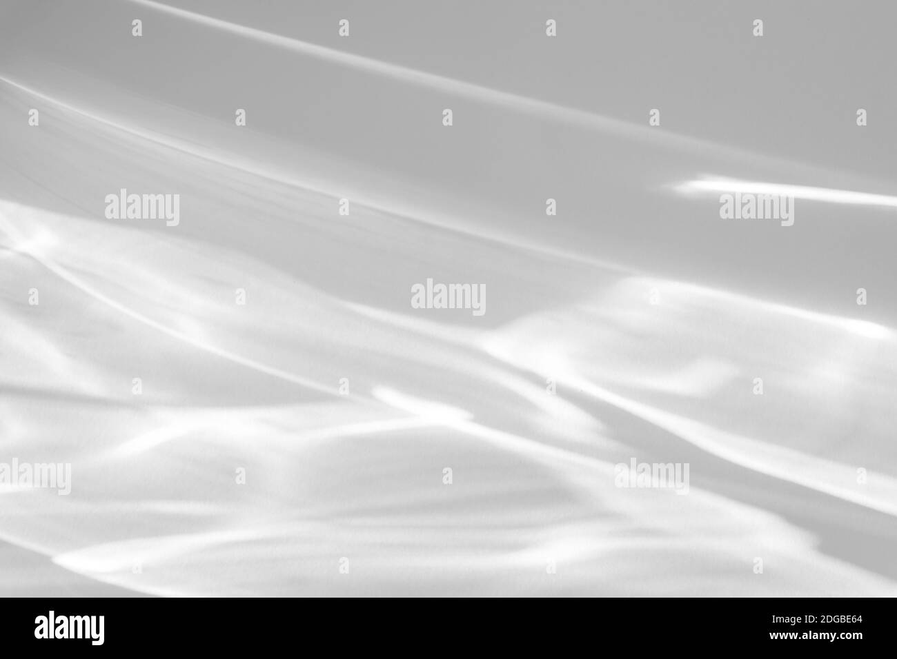 shadow and light caustic effect on a white wall Stock Photo - Alamy