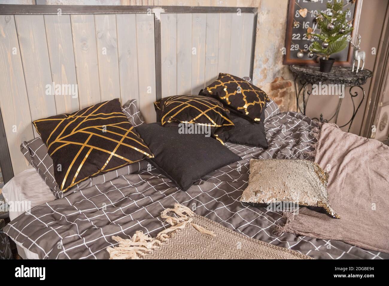 New Year's interior. Christmas tree bed with soft blue back and ...