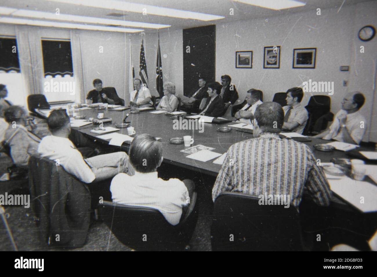 Fine 1970s vintage black and white photography of a business meeting ...