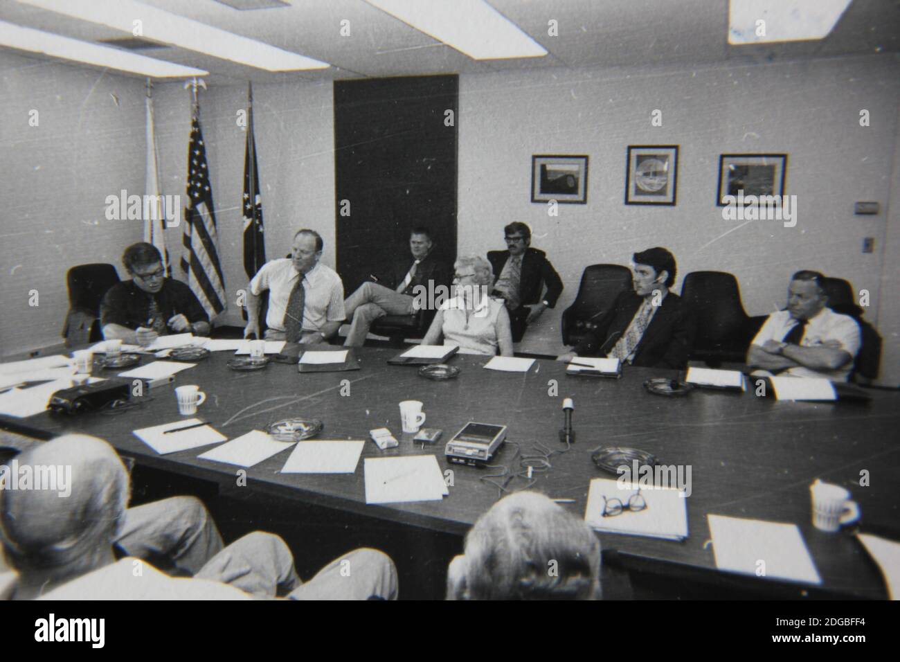 Fine 1970s vintage black and white photography of a business meeting ...