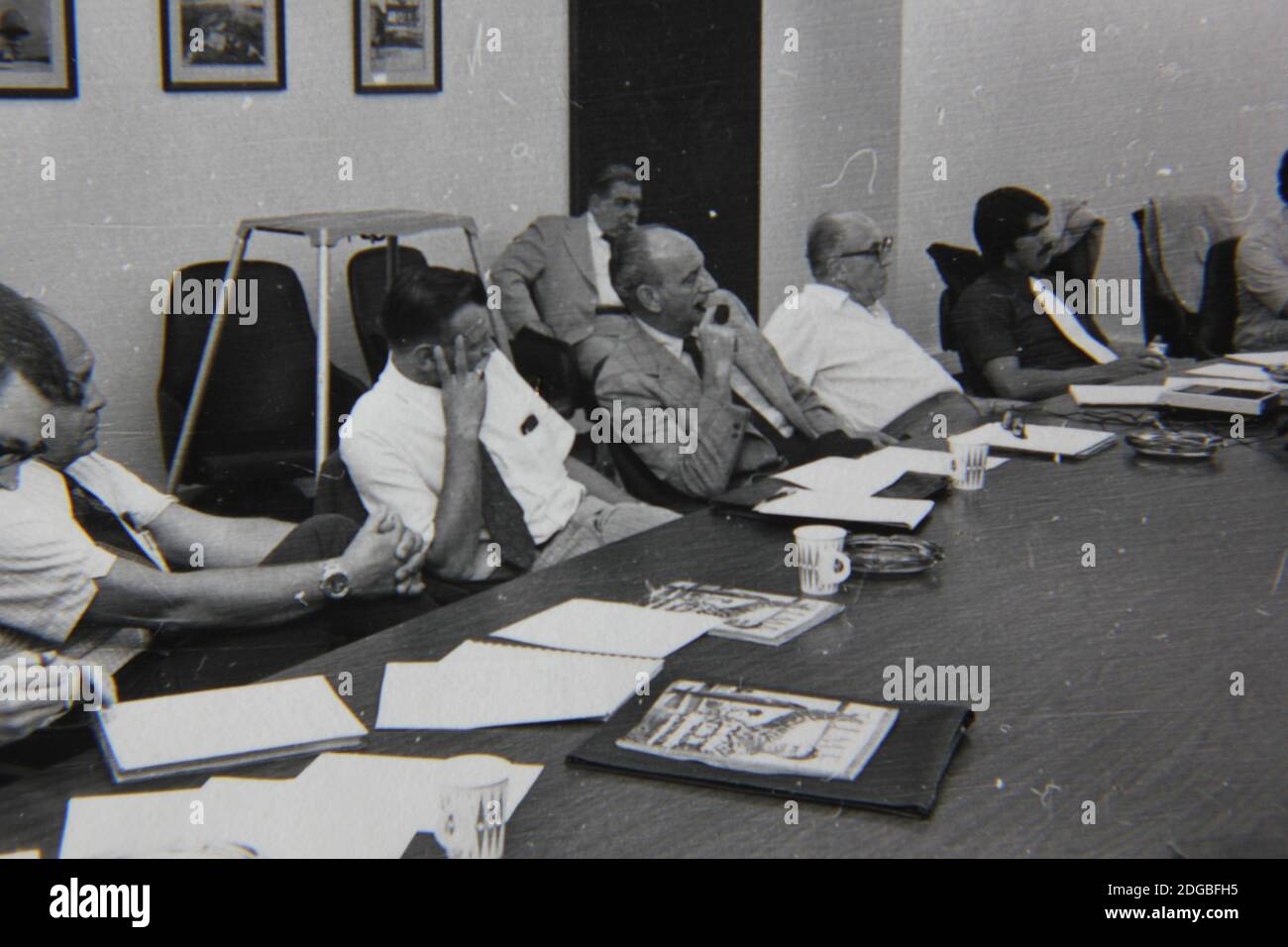 Fine 1970s vintage black and white photography of a business meeting ...