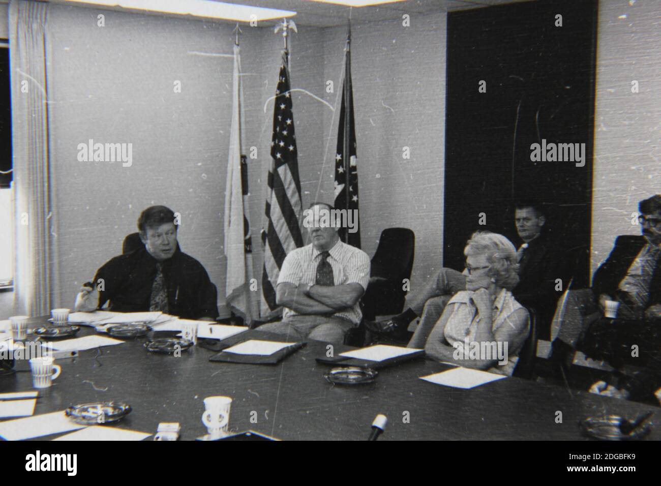 Fine 1970s vintage black and white photography of a business meeting ...