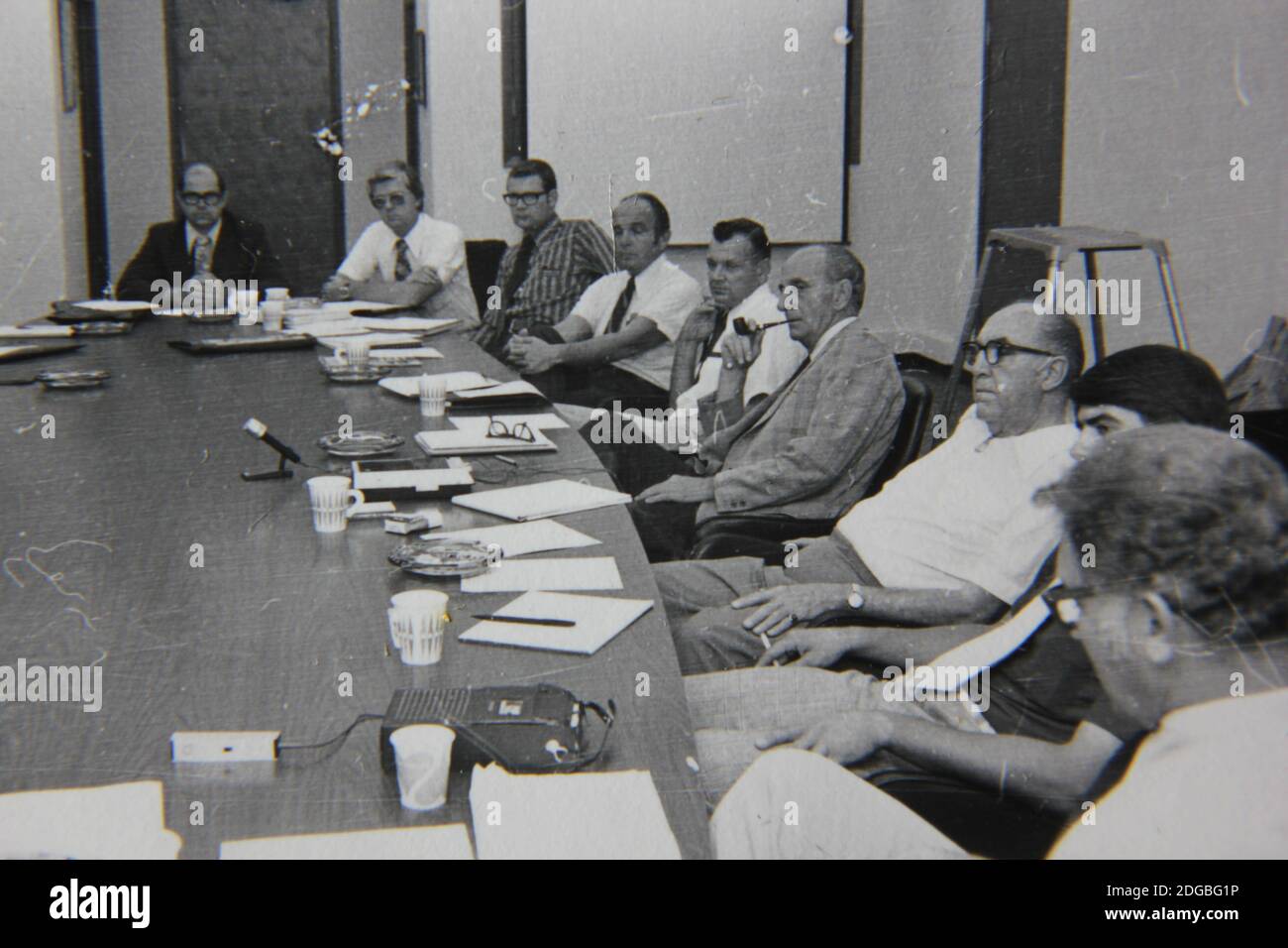 Fine 1970s vintage black and white photography of a business meeting ...