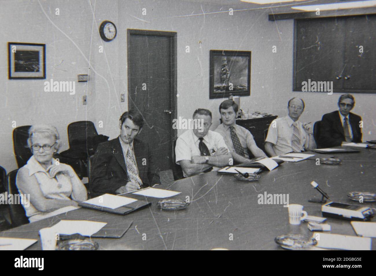 Fine 1970s vintage black and white photography of a business meeting ...