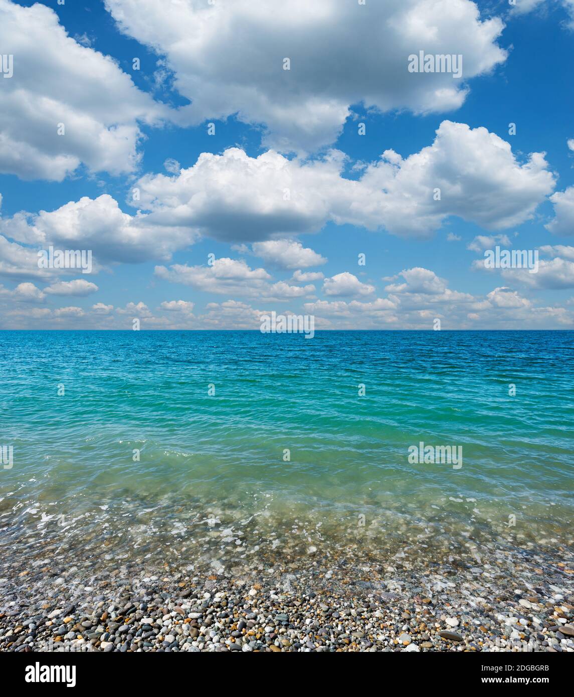 Calm surface of the ocean at summer day time Stock Photo - Alamy