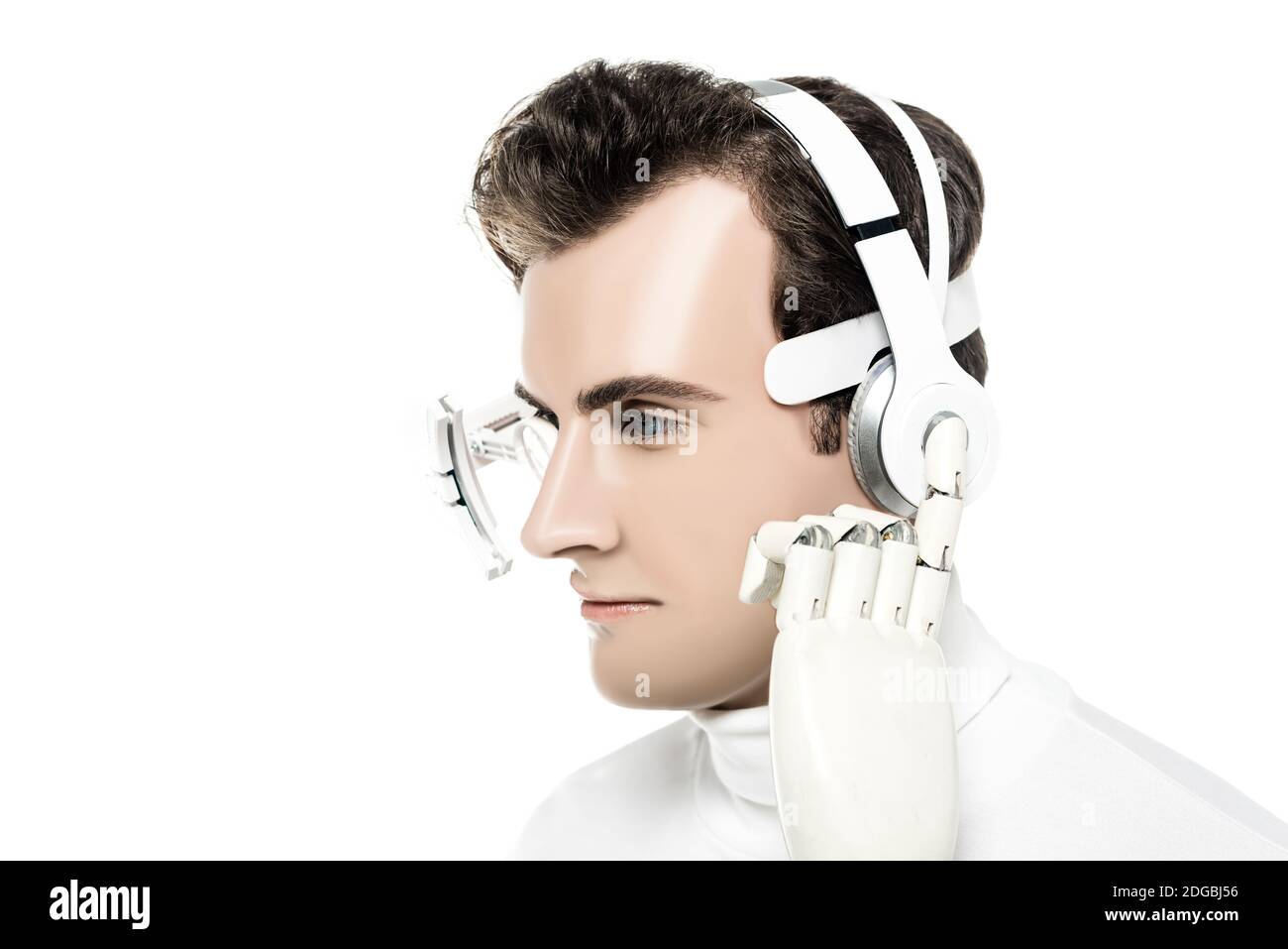 Cyborg in eye lens touching headphones with artificial hand isolated on ...