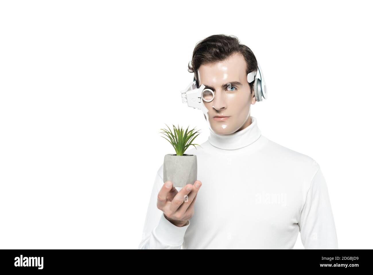 Cyborg in eye lens and headphones holding pot with plant isolated on ...