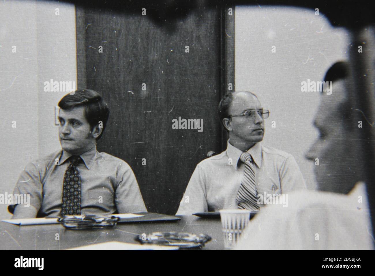Fine 1970s vintage black and white photography of a business meeting ...