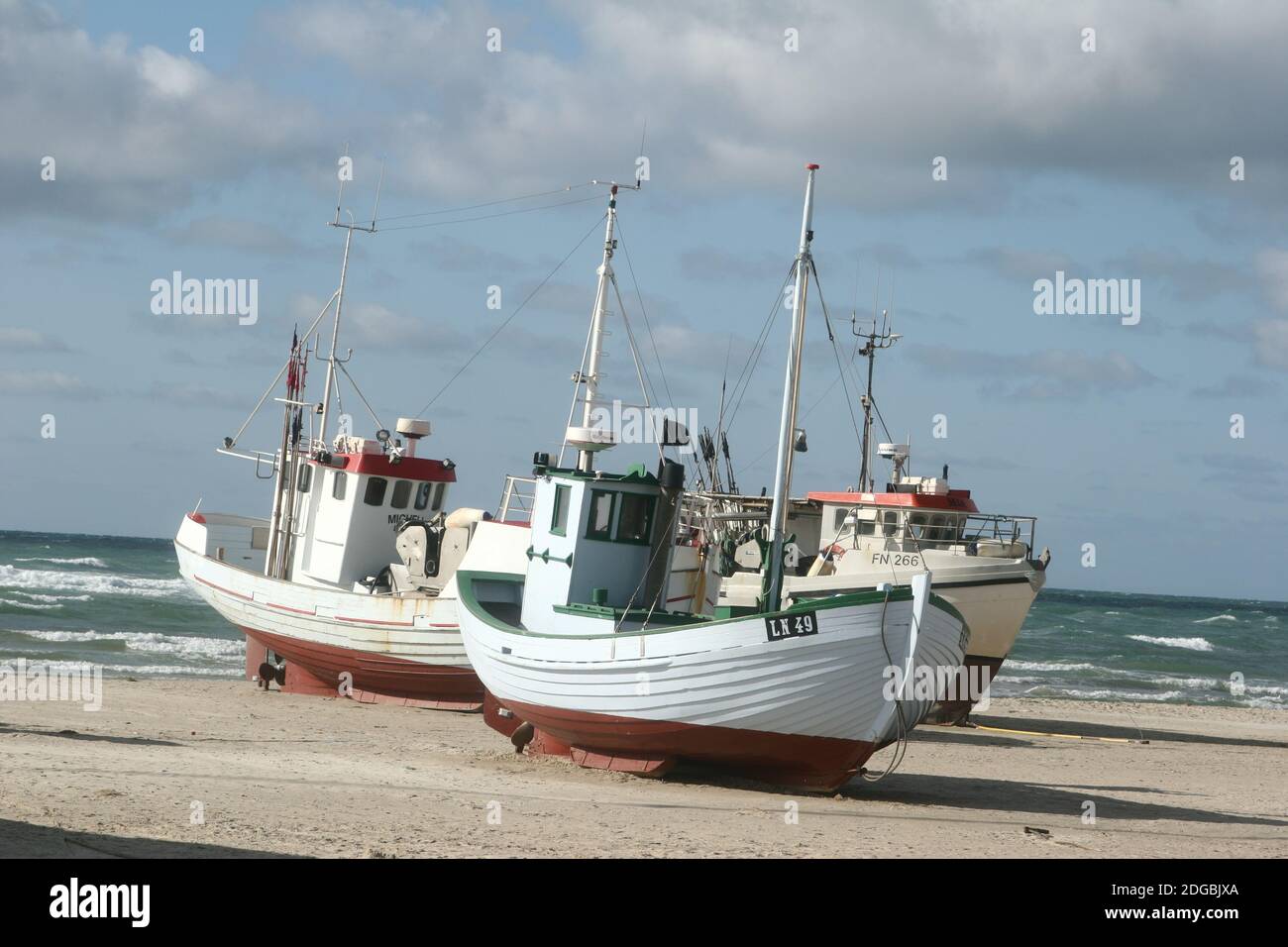 Fishing Boat at a beach in Denmark Stock Photo - Alamy