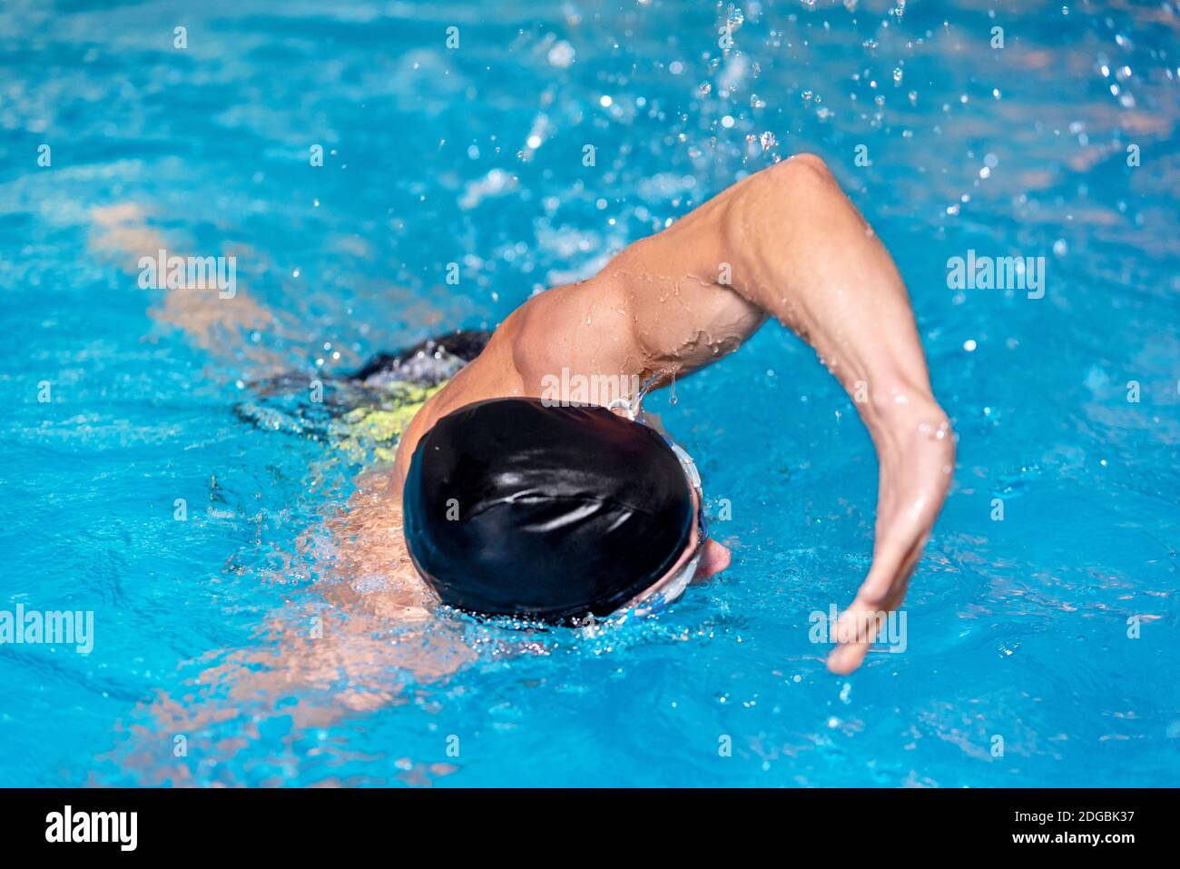 Swimming pool sport crawl swimmer. Man doing freestyle stroke technique ...