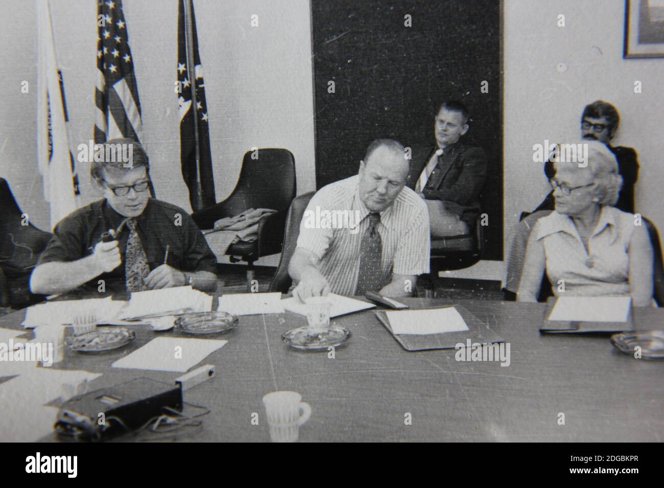 Fine 1970s vintage black and white photography of a business meeting ...