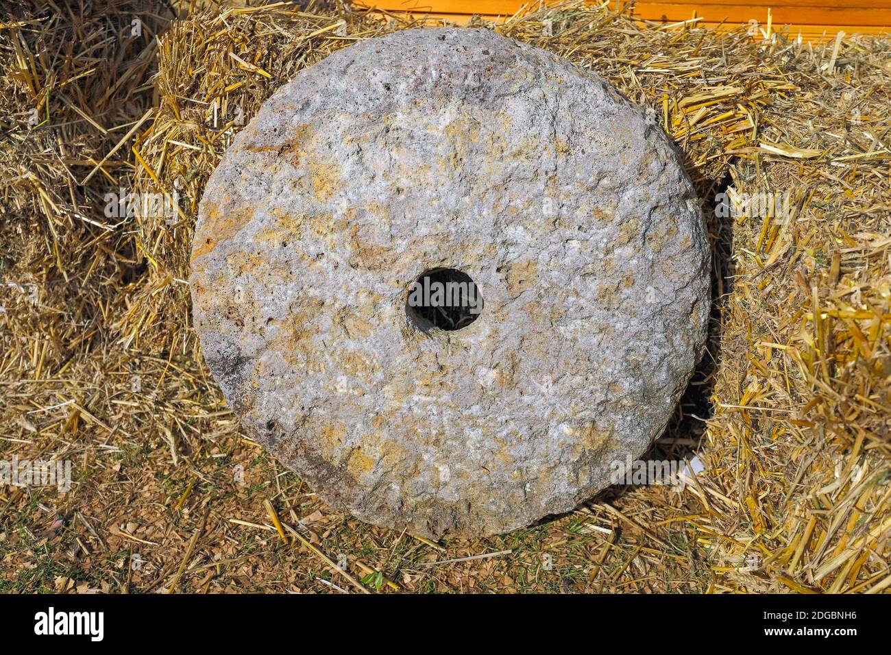Very Old Runner Stone Millstone for Gristmill Stock Photo - Alamy