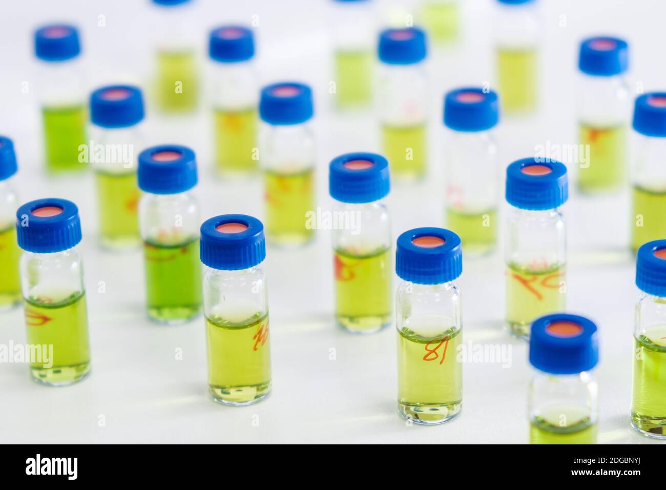 Pattern from HPLC glass vials with green fluid. Pharmaceuticals and ...