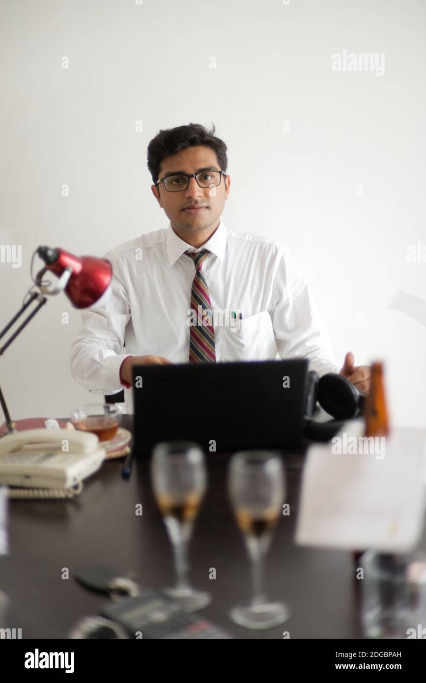 Indian Bengali tall, dark, handsome brunette young man in office wear ...