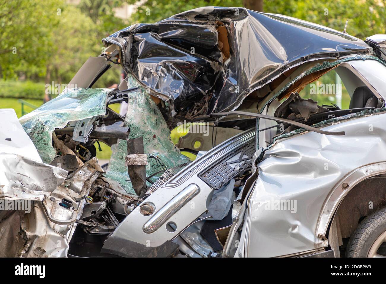 Crushed Small Car Damaged in Traffic Accident Stock Photo - Alamy