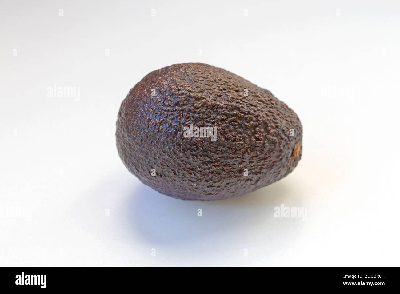 Dark Brown Skin at One Avocado Vegetable Stock Photo - Alamy