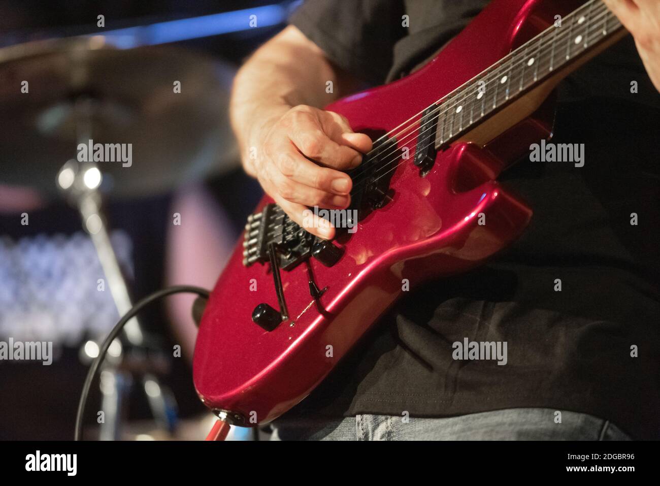 Man lead guitarist playing electrical guitar on concert stage Stock ...