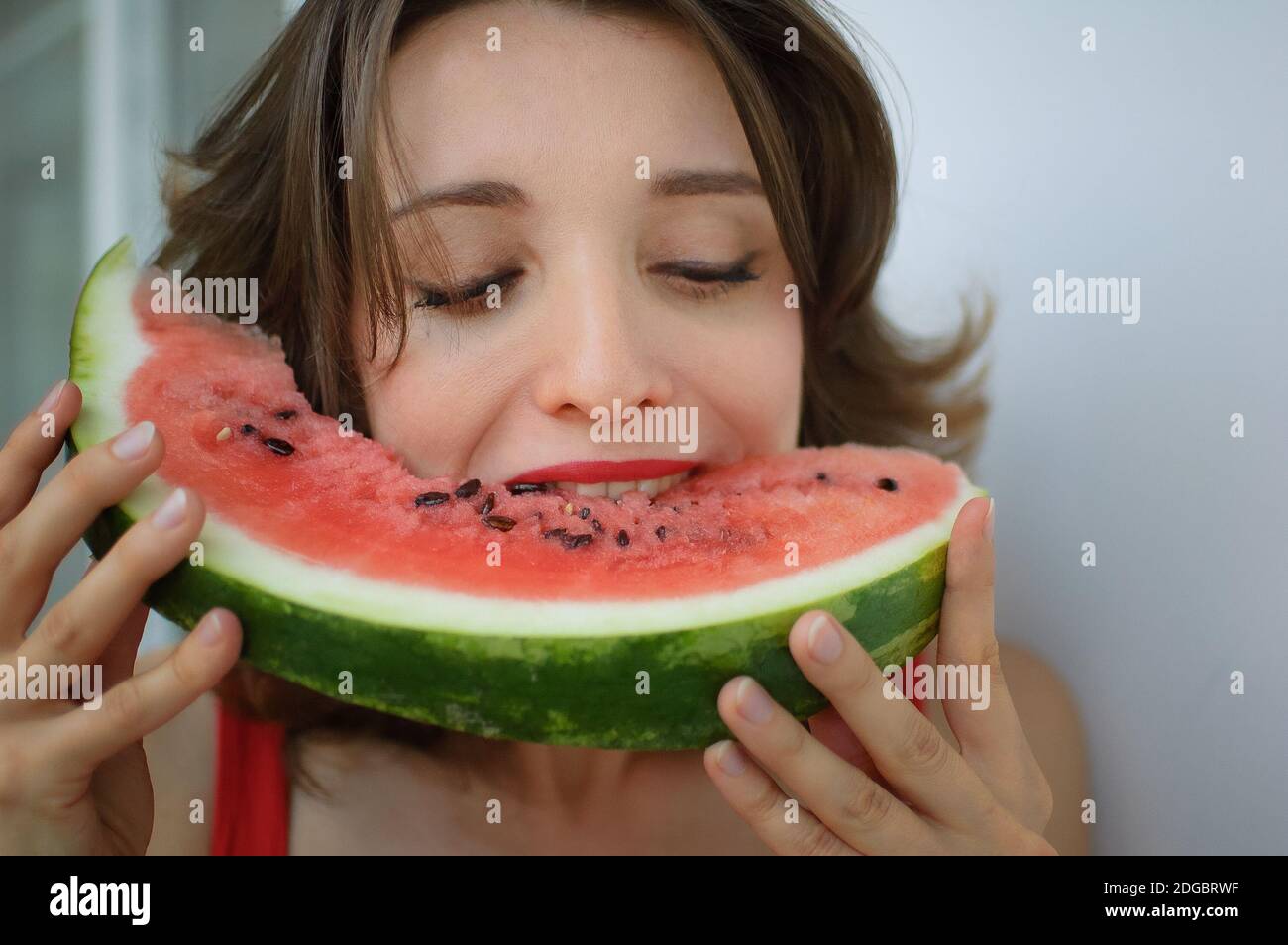 Close up indoors portrait of beautiful woman with short hair and ...