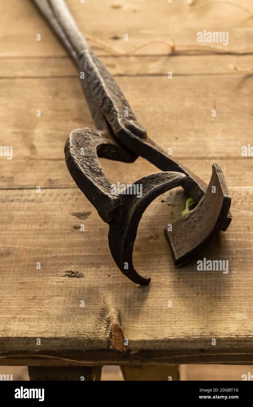 Large and iron horn tongs, round tongs to extract molten metal Stock ...