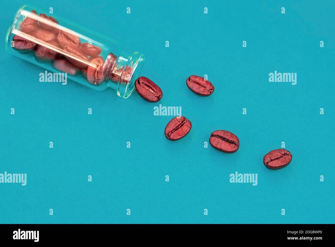 Abstract blue background with medicine pill bottle of toasted coffee ...