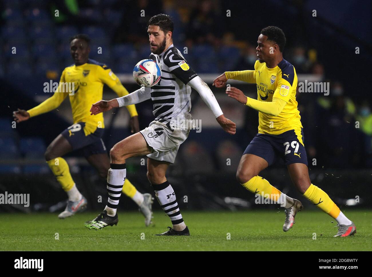 Oxford United's Derick Osei Yaw (right) and Forest Green Rovers' Dan ...