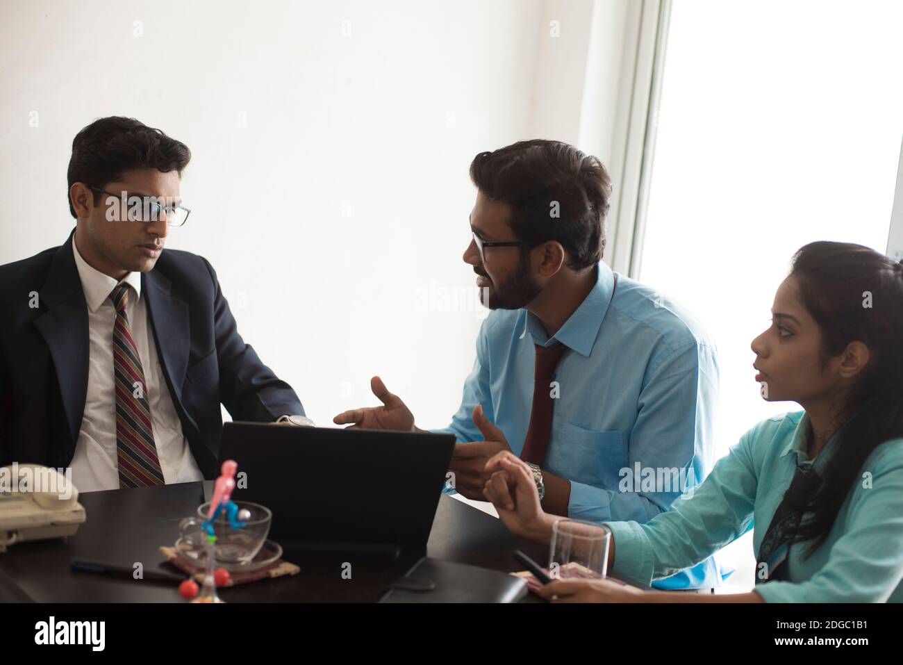 Corporate board meeting in Indian office between young and energetic ...