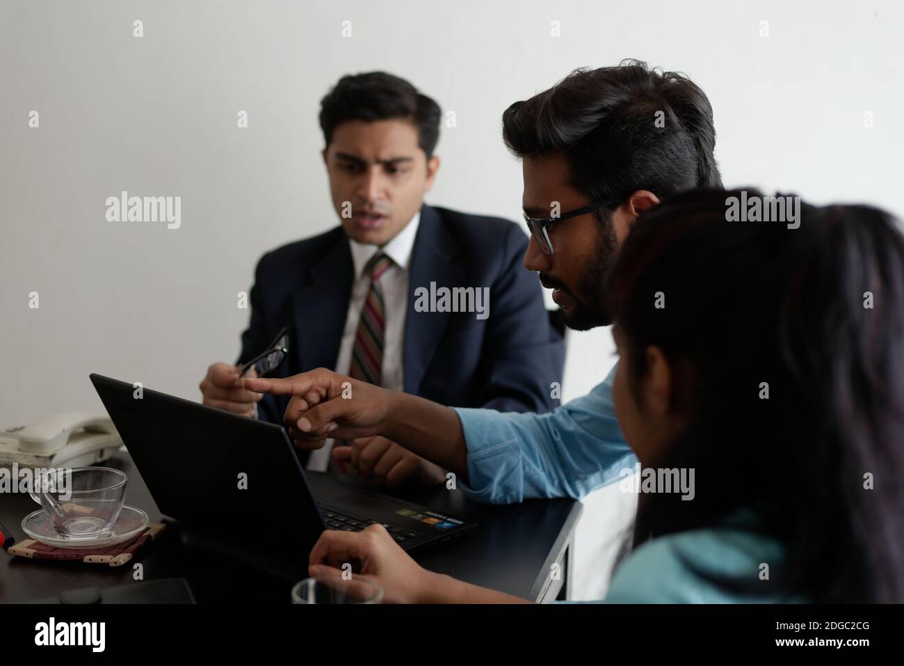 Corporate board meeting in Indian office between young and energetic ...