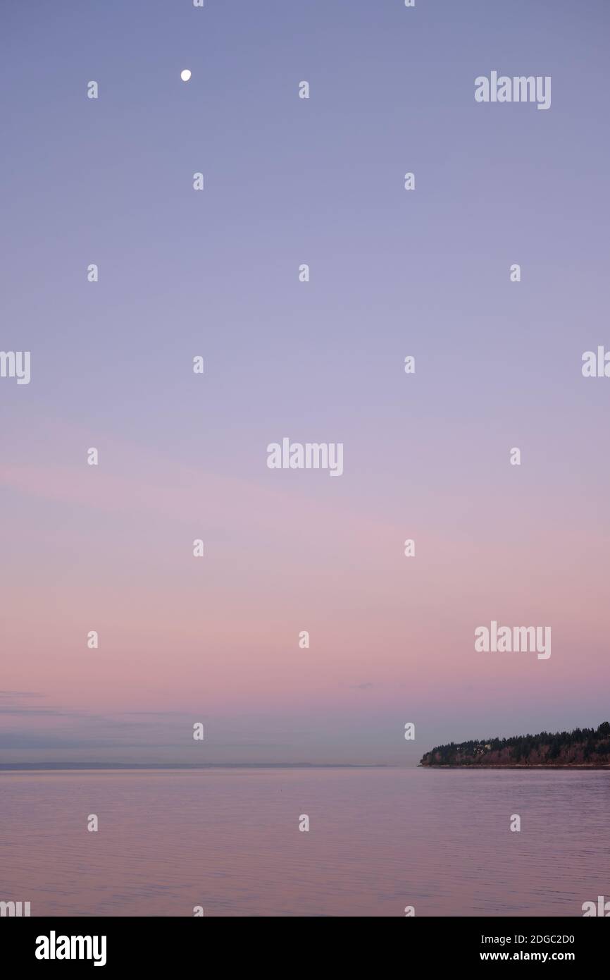With a glorious sunrise behind photographer, calm sea near White Rock ...