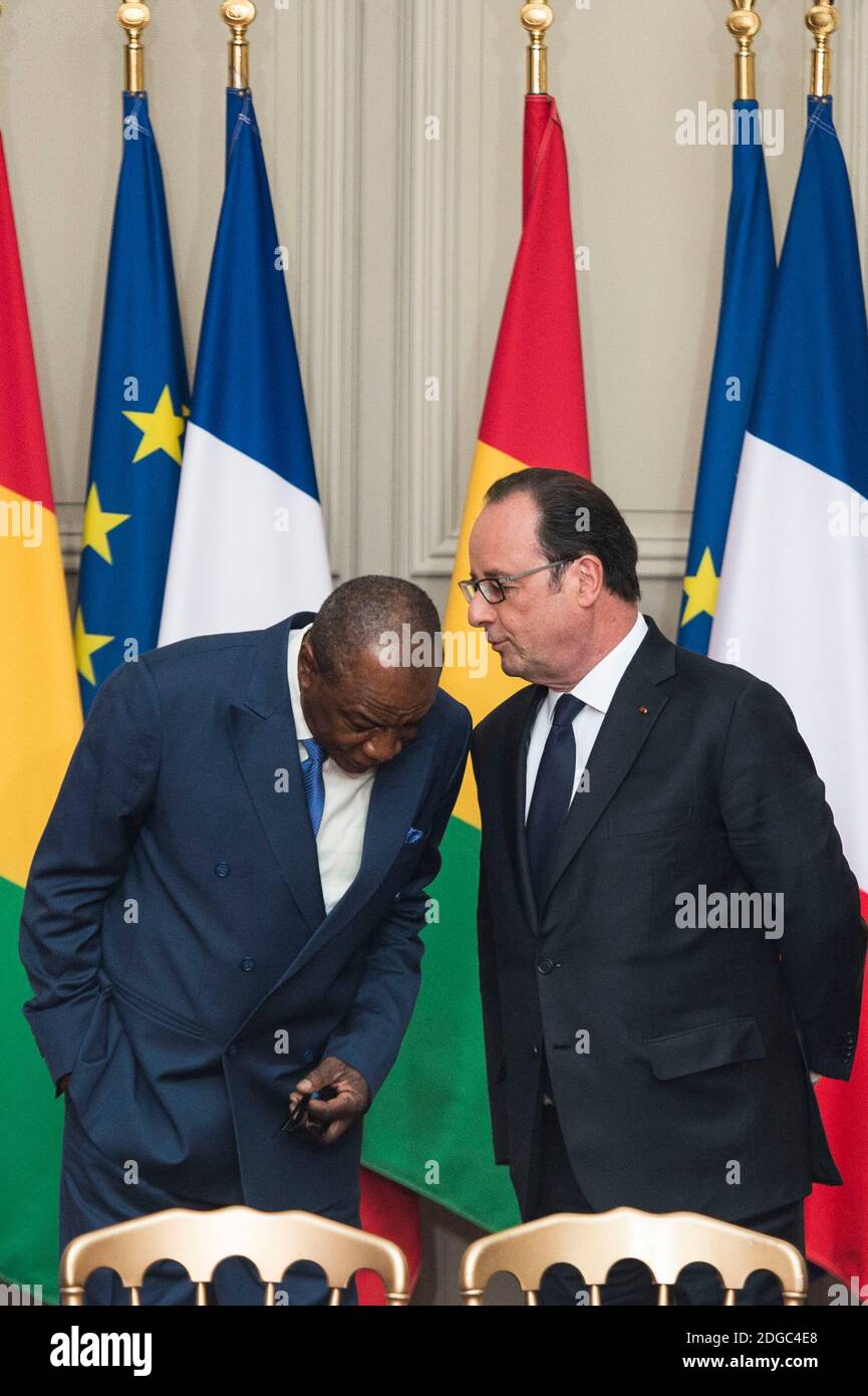 French President Francois Hollande and his Guinean counterpart Alpha ...