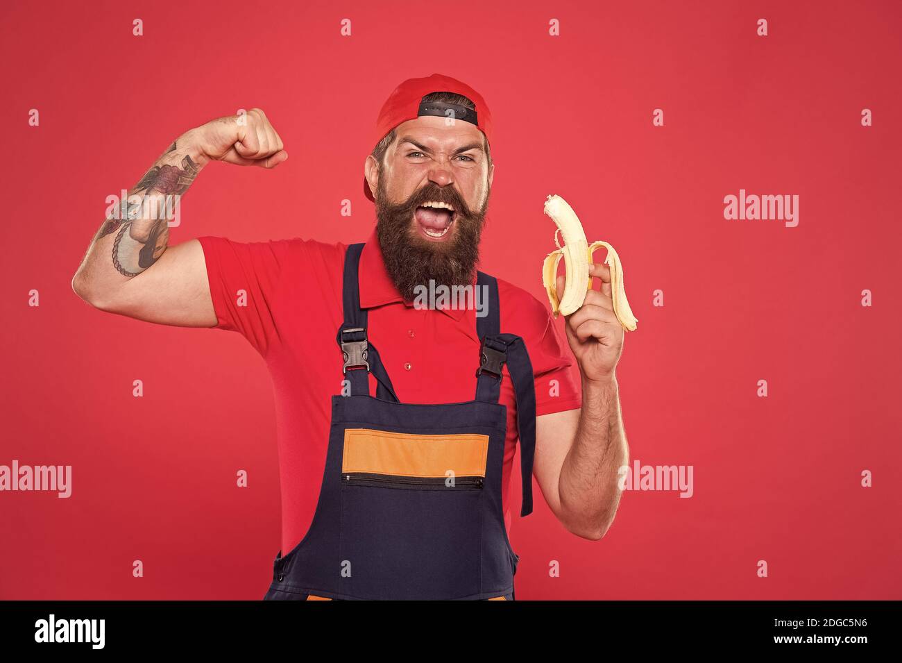 Fresh vitamins. Tasty food. Bite banana. Hungry hipster. Favorite snack ...