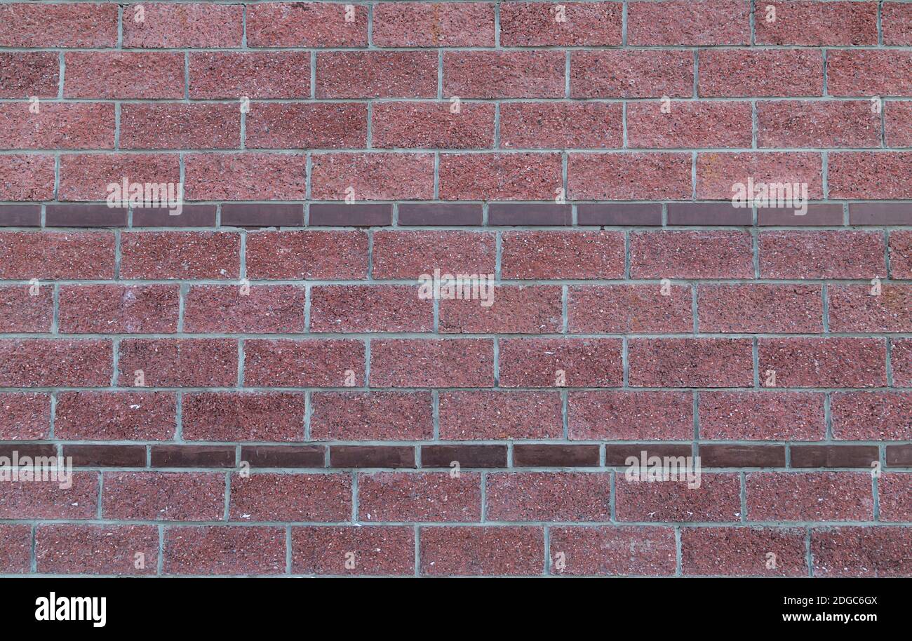 Brick red background with borders of narrow rectangular stone border ...