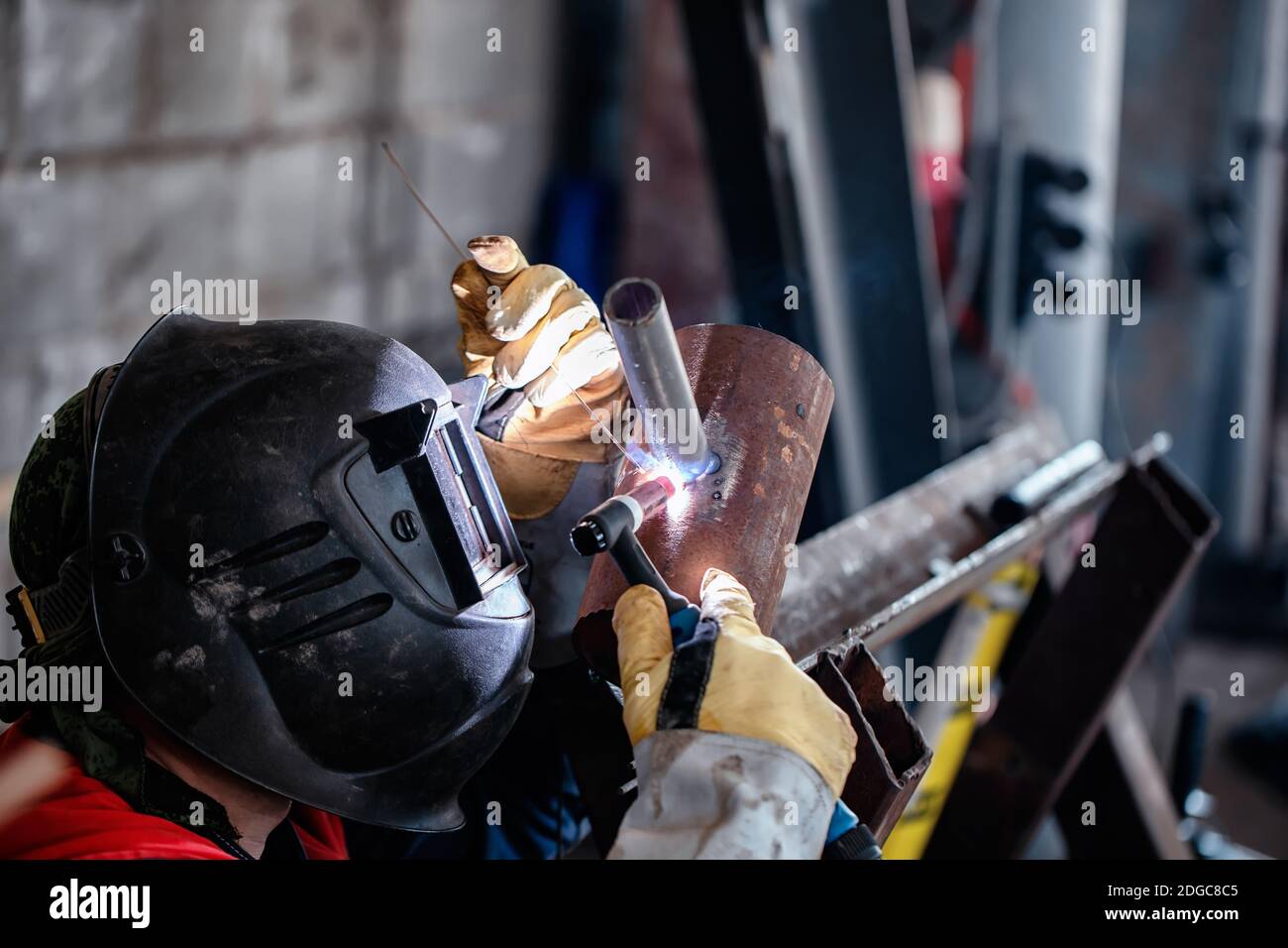 Argon arc welding control sample of carbon steel pipes Stock Photo - Alamy