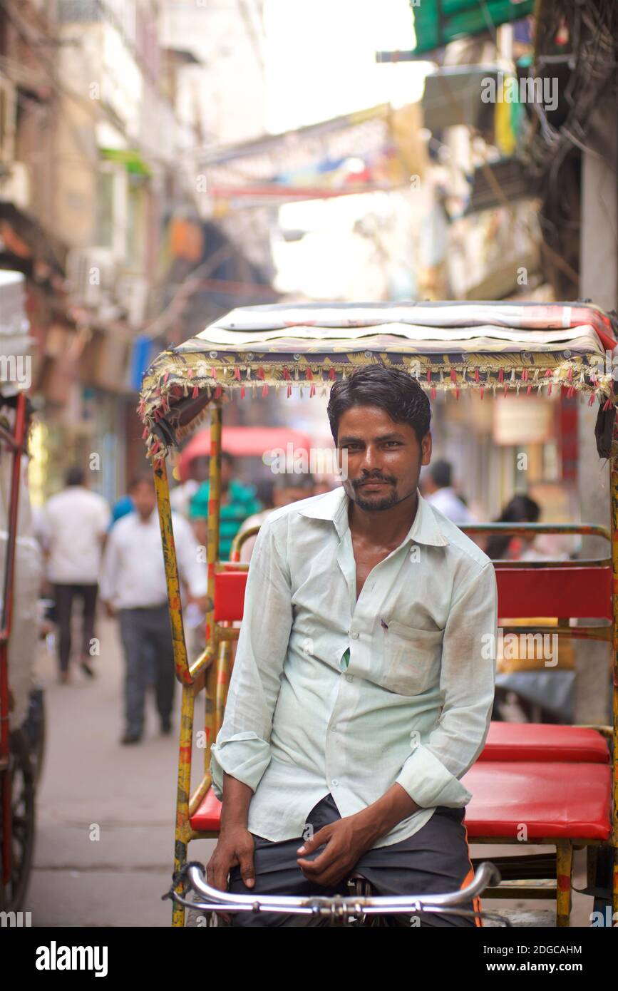 Friendly Indian rickshaw driver in the narrow streets of Chandi Chowk ...