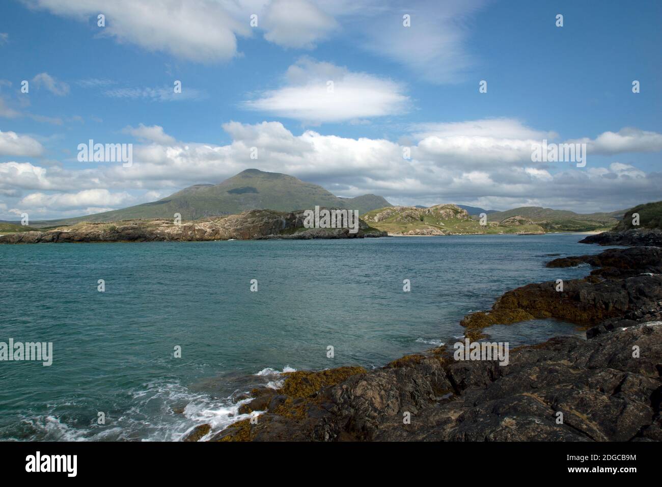 View across the stunning blue sea at Renvyle beach campsite looking ...