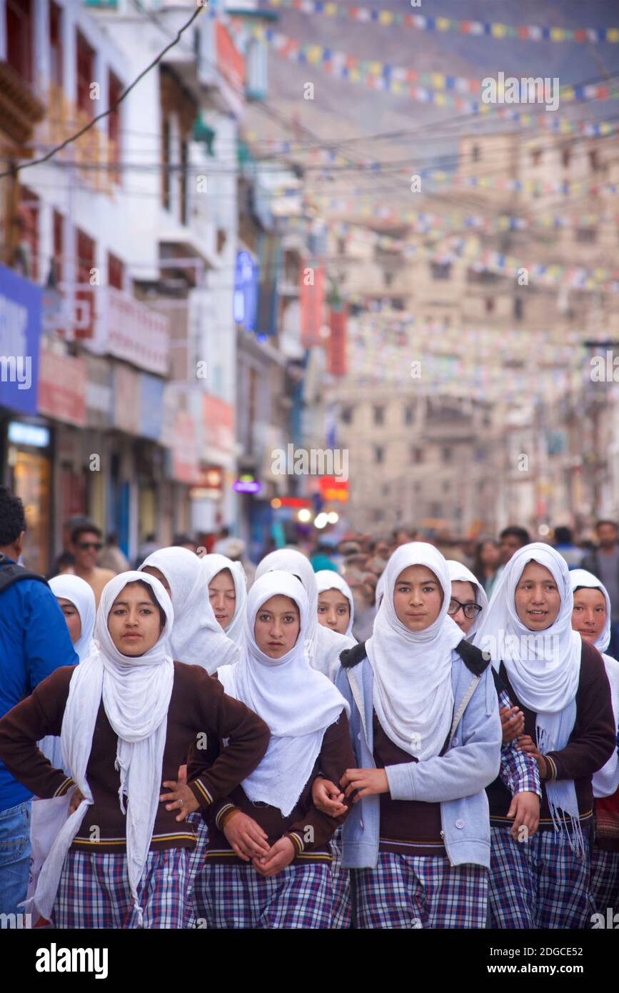 Group of friendly muslim girls wearing headcloths in Leh street. Leh ...