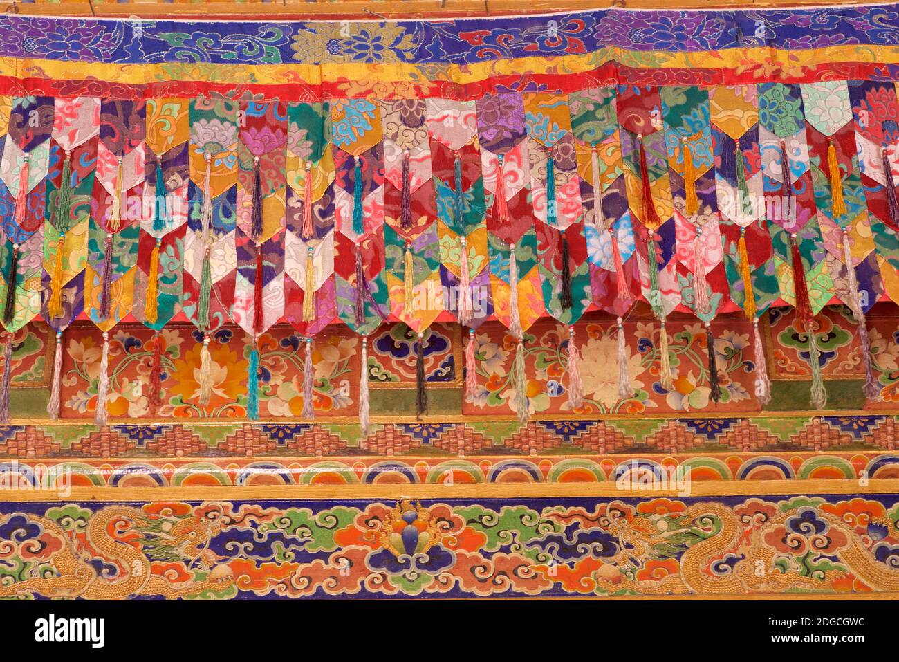 Detail of buddhist textiles and painted woodwork at Spituk Gompa. Leh ...