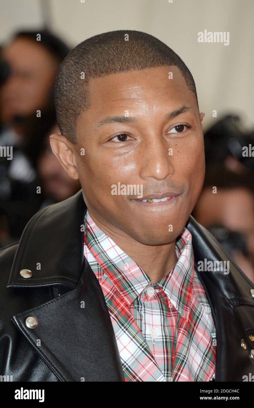 Pharrell Williams arriving on the red carpet at the Costume Institute ...