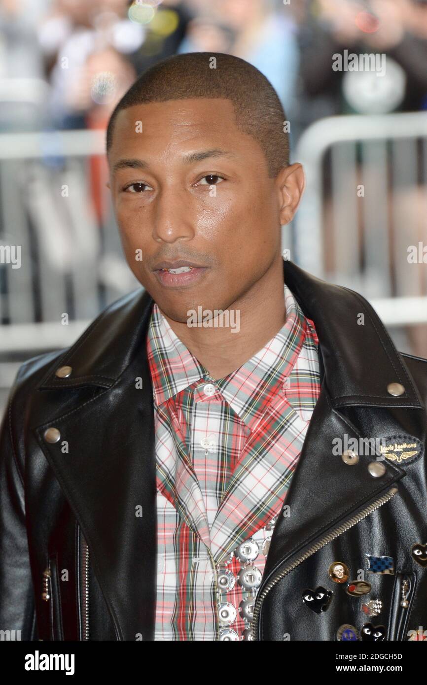 Pharrell Williams arriving on the red carpet at the Costume Institute ...