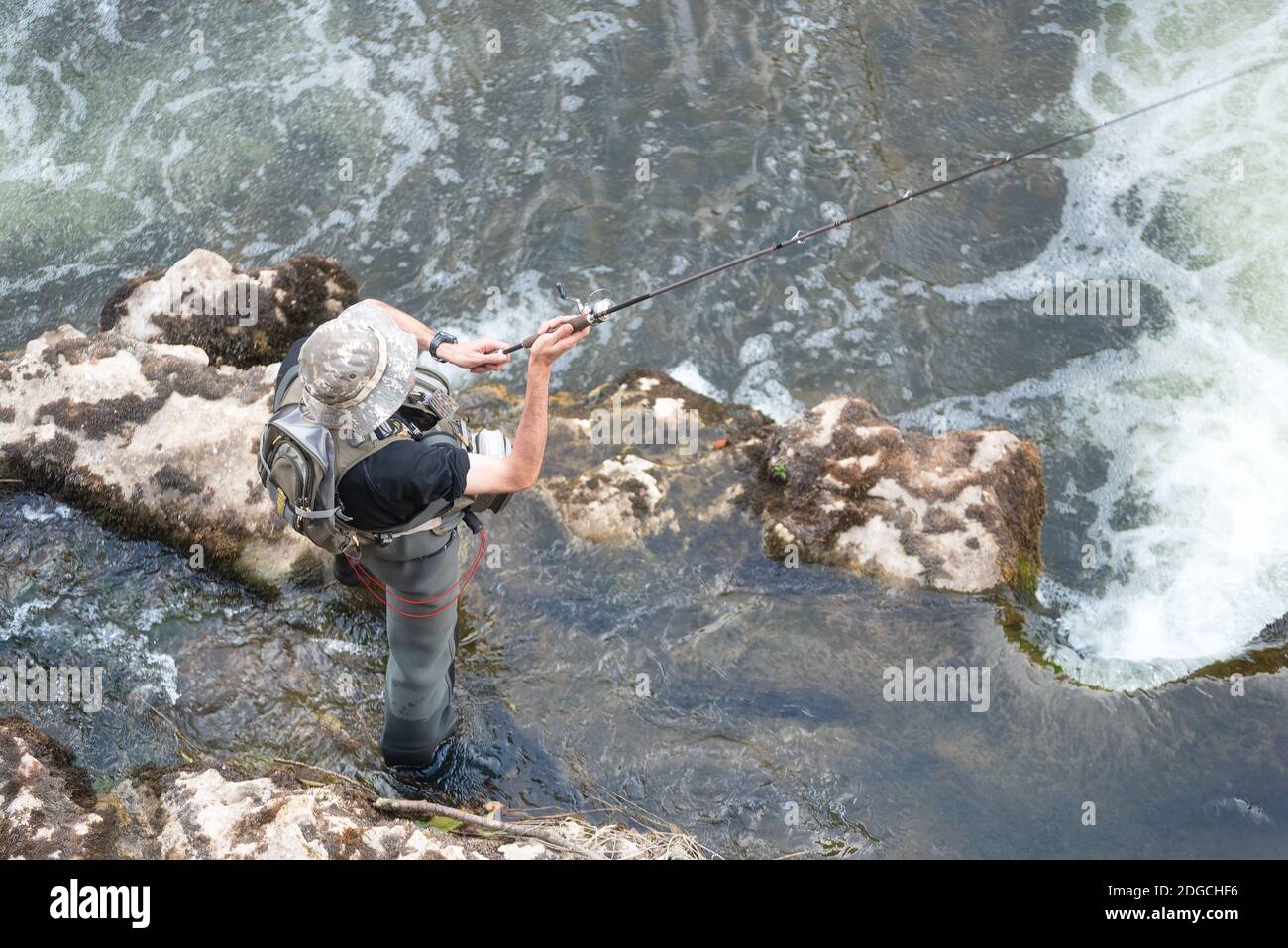 Aerial view of sport Fisher fishing in the river Stock Photo - Alamy