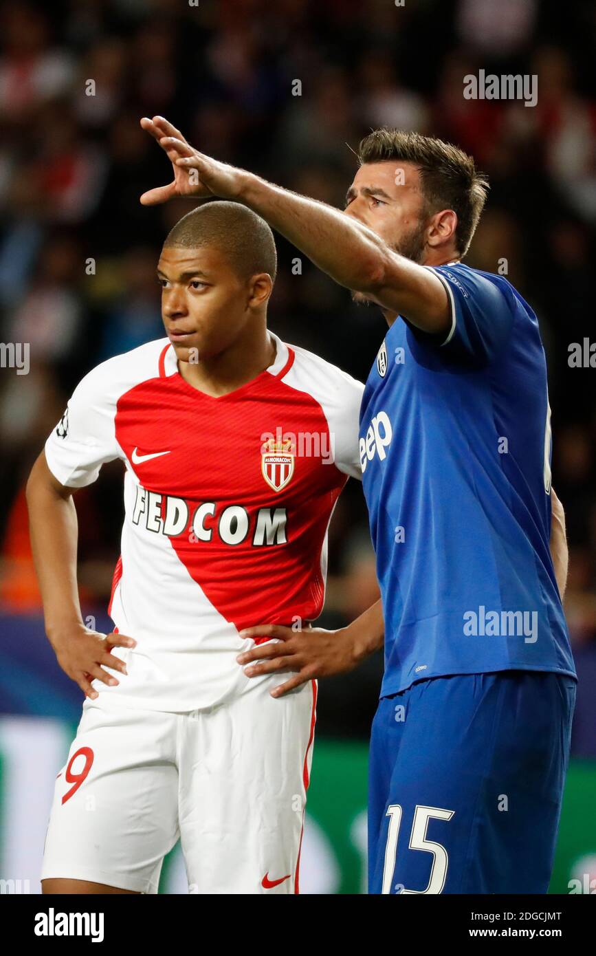 Monaco's Kylian Mbappe battles Juventus'Andrea Barzagli during the ...