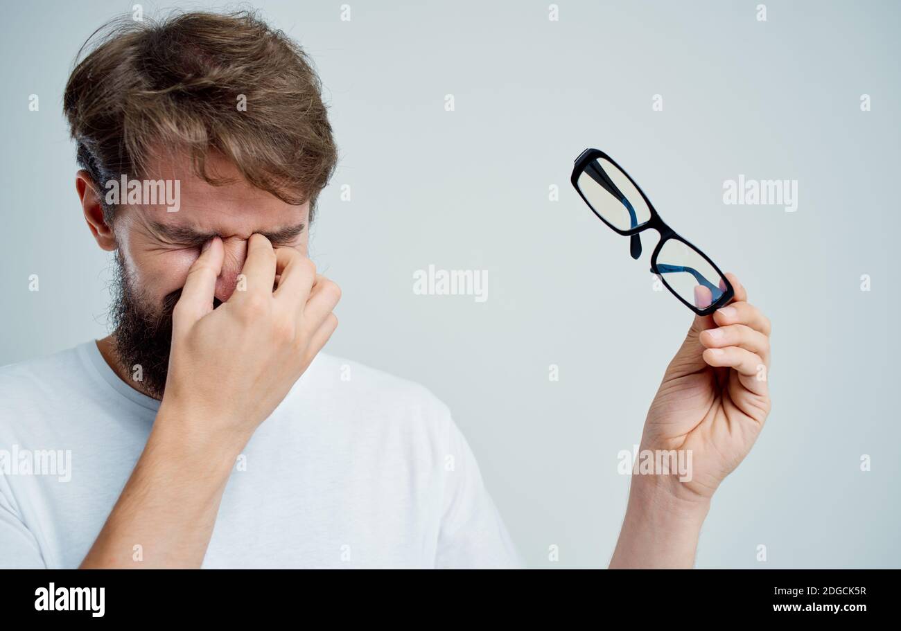 man with glasses vision problems myopia studio Stock Photo - Alamy