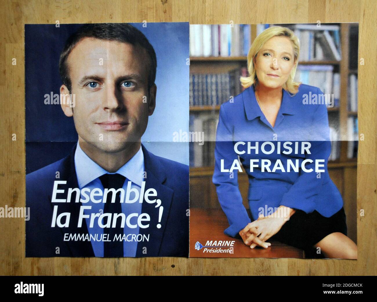 A presidential campaign poster shows centrist candidate Emmanuel Macron ...