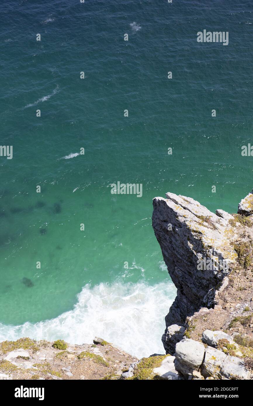 Steep cliff sea Stock Photo - Alamy
