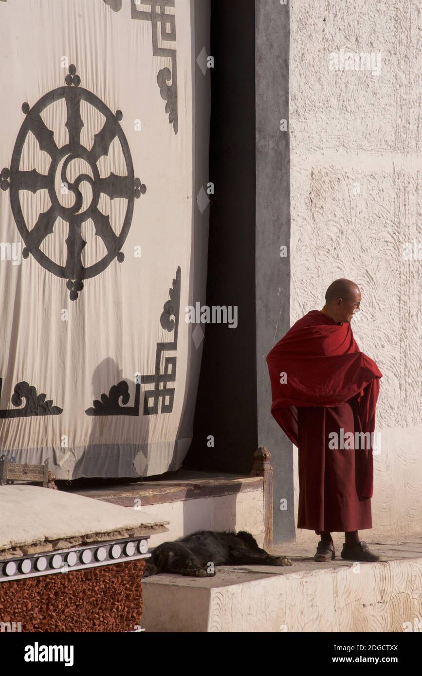 Early morning at Hemis monastery. A monk outside the prayer hall. Hemis ...