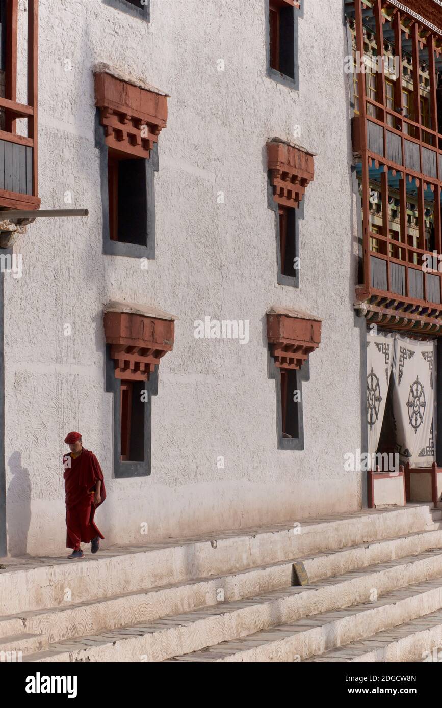 Early morning at Hemis monastery. A monk heading to the prayer hall ...