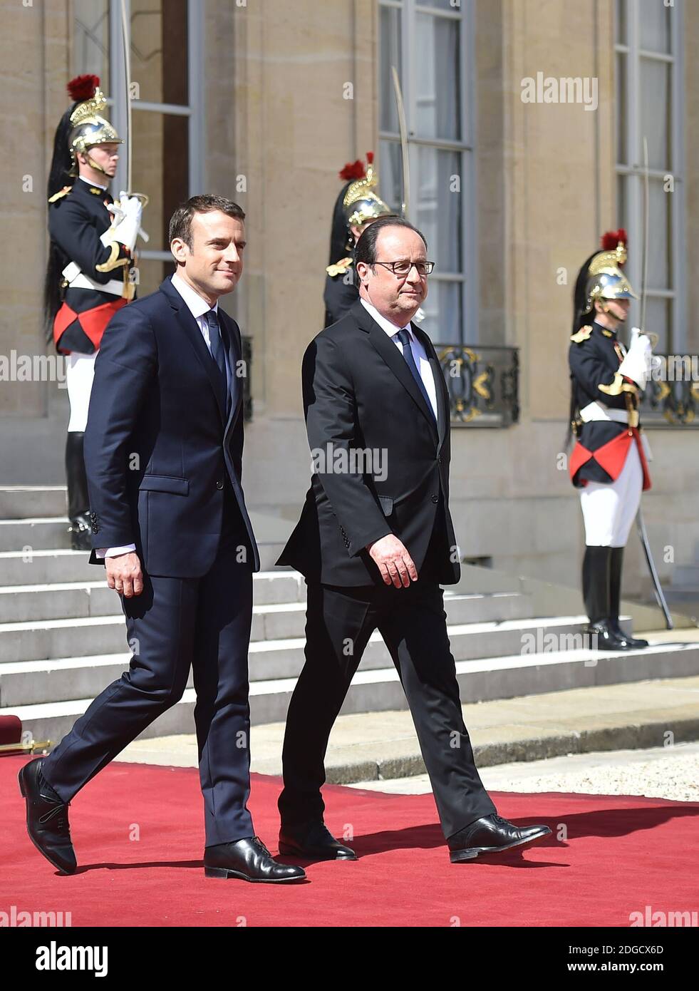 French President-elect Emmanuel Macron and his wife Brigitte see out ...